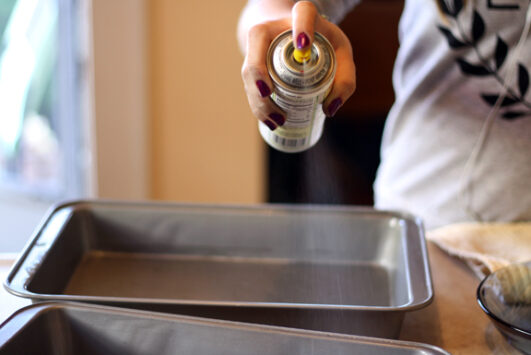 Do I spray the pan when baking cookies?