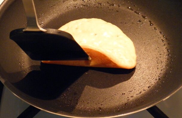 How do you flip pancakes?