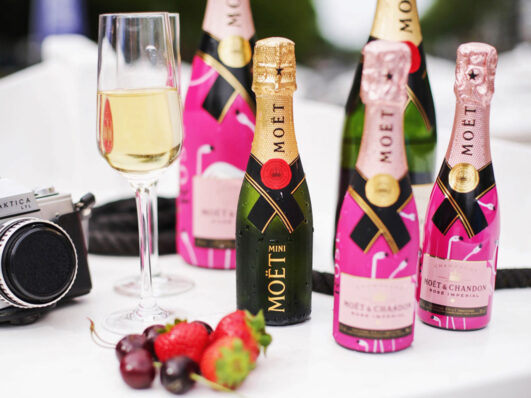 What are mini champagne bottles called?